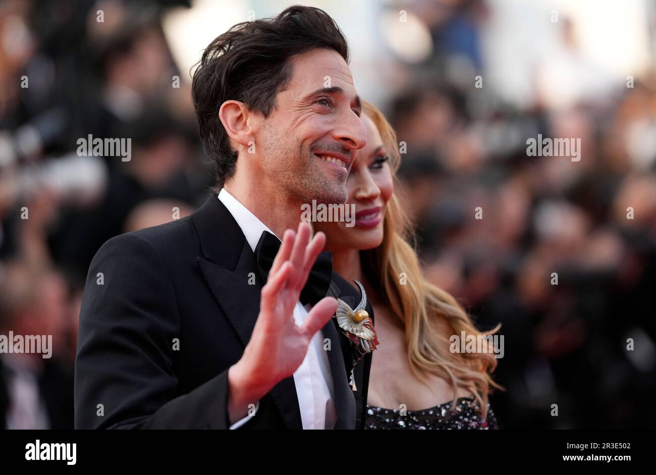 Adrien Brody, from left, and Georgina Chapman pose for photographers ...