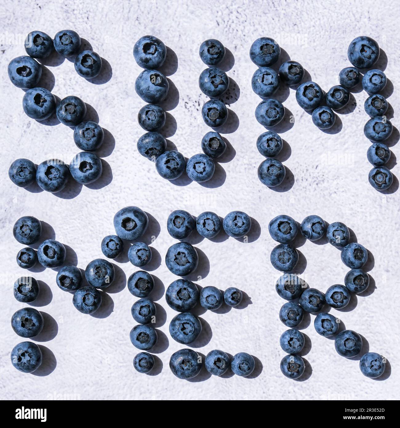 Summer inscription lined from blueberries. Fruits and berries ...