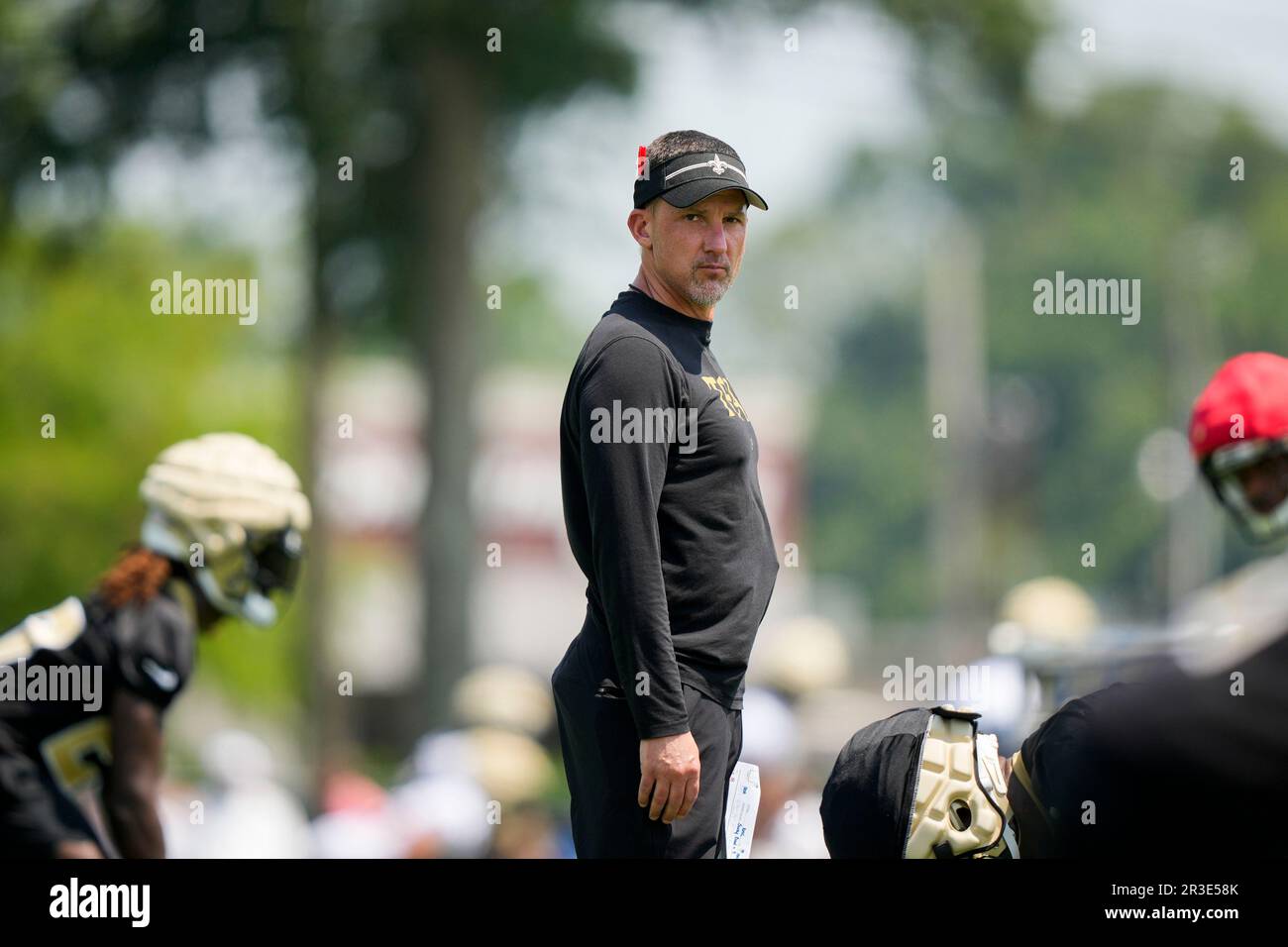 New Orleans Saints head coach Dennis Allen watches drills during an NFL ...