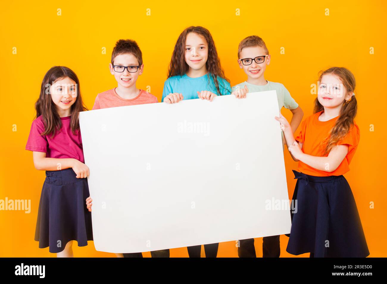 Little boy holding placard blank hi-res stock photography and images ...