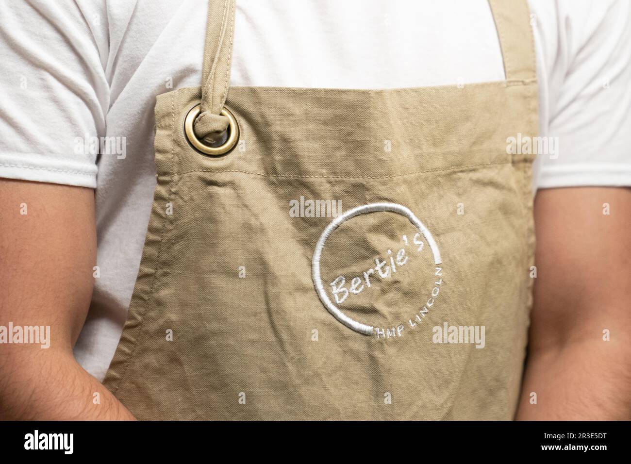 The logo on a chef's apron at a new Right Course restaurant named ...