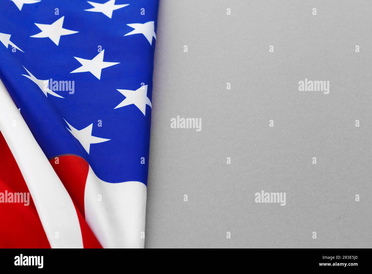 American flag on grey background Stock Photo - Alamy