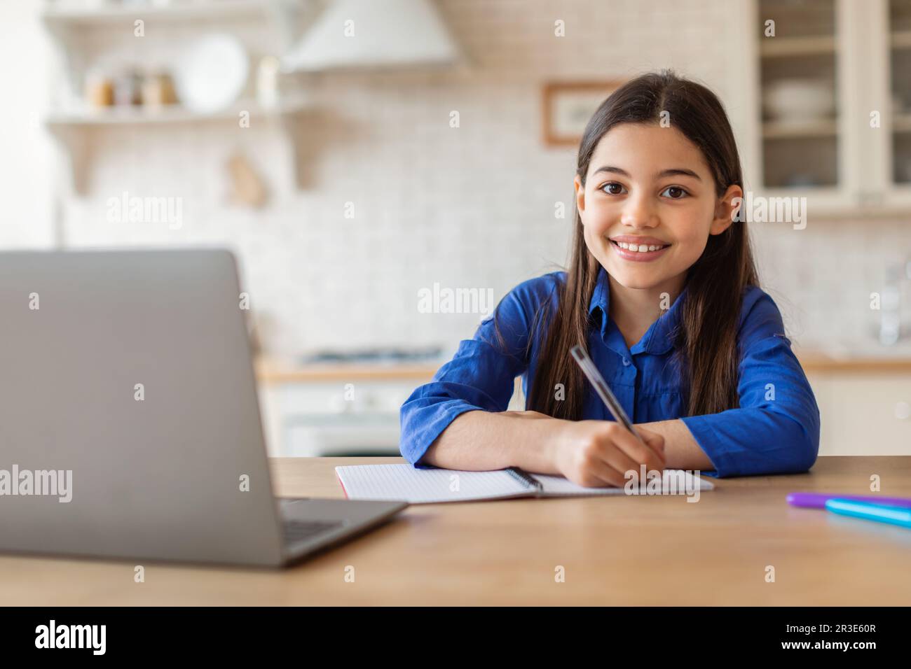 Girl Taking Notes At Laptop Embracing E-Learning, Studying From Home ...