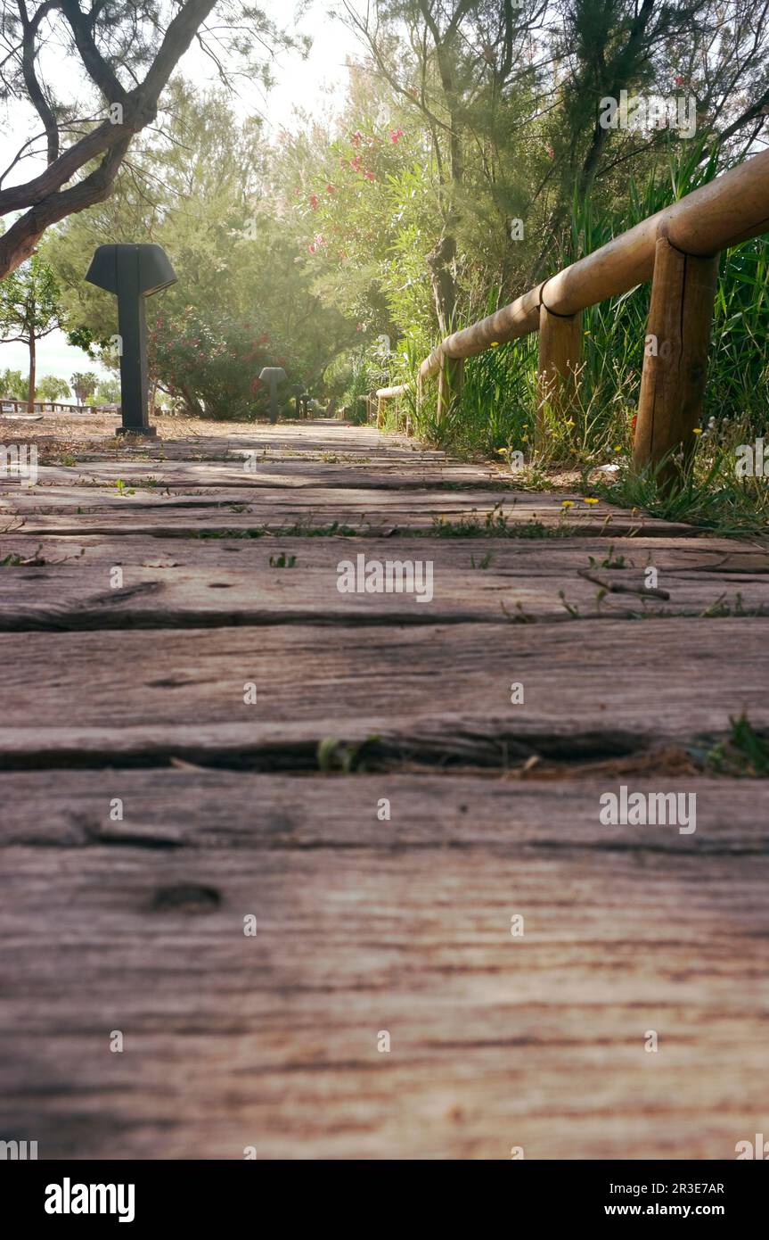 A long wooden path to freedom Stock Photo - Alamy