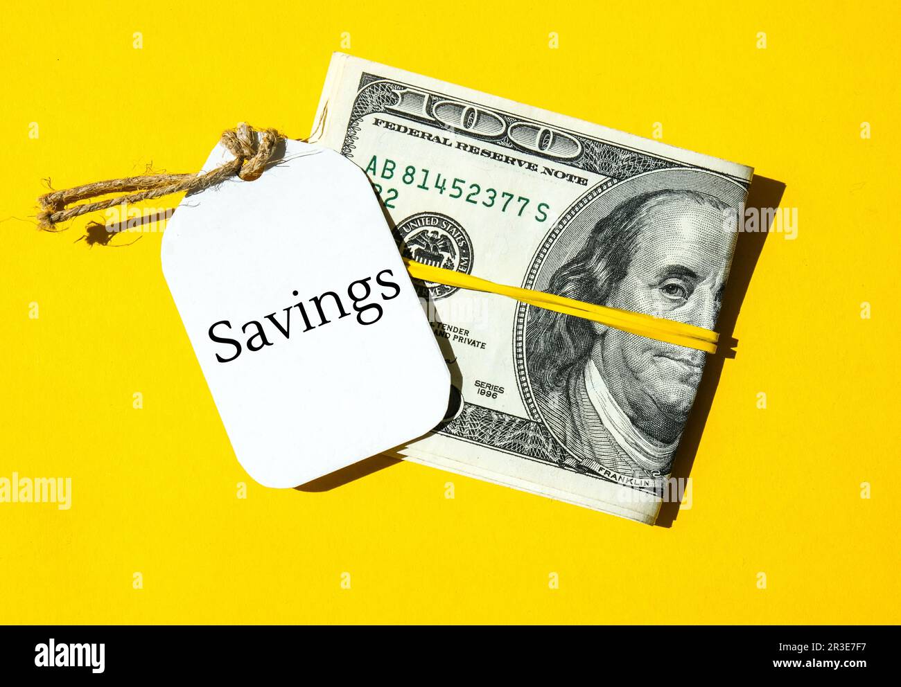 Paper note written text SAVINGS. Save money. Save today for tomorrow ...