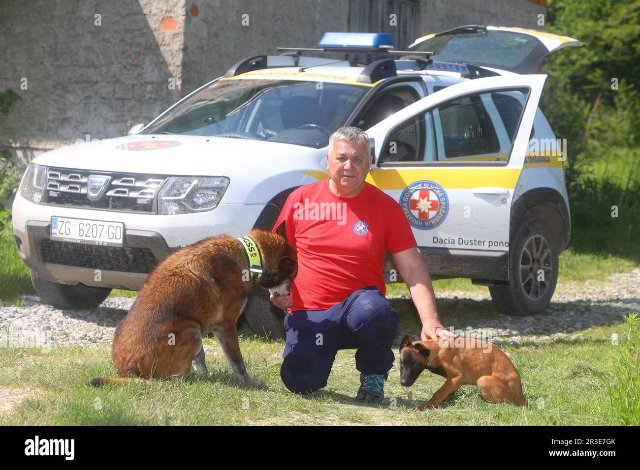 Handler Kruno Stipetic pose for a photo with Belgian shepherd puppy ...