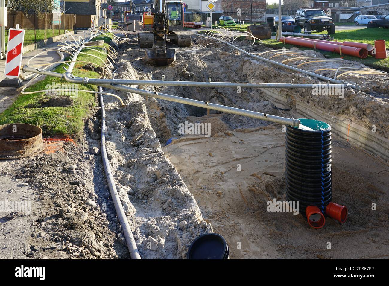 Street underground piping reconstruction view with dewatering system ...