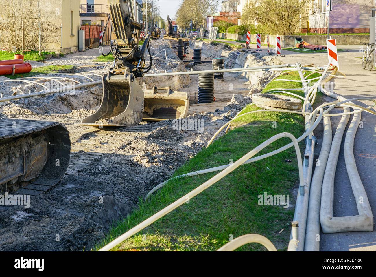Street underground piping reconstruction view with dewatering system ...