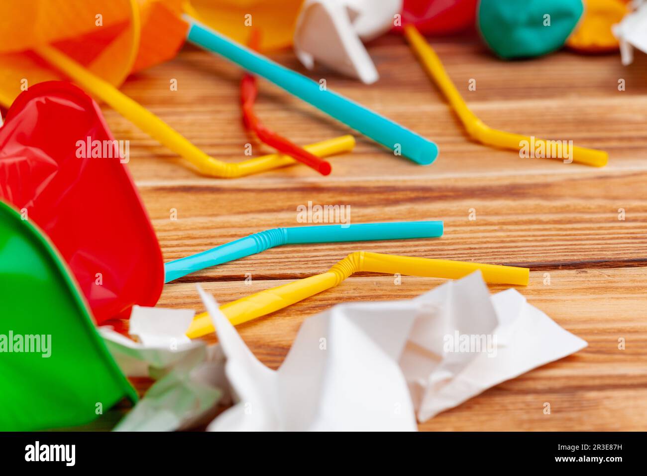 Plastic objects, recycle garbage on a wooden background Stock Photo - Alamy