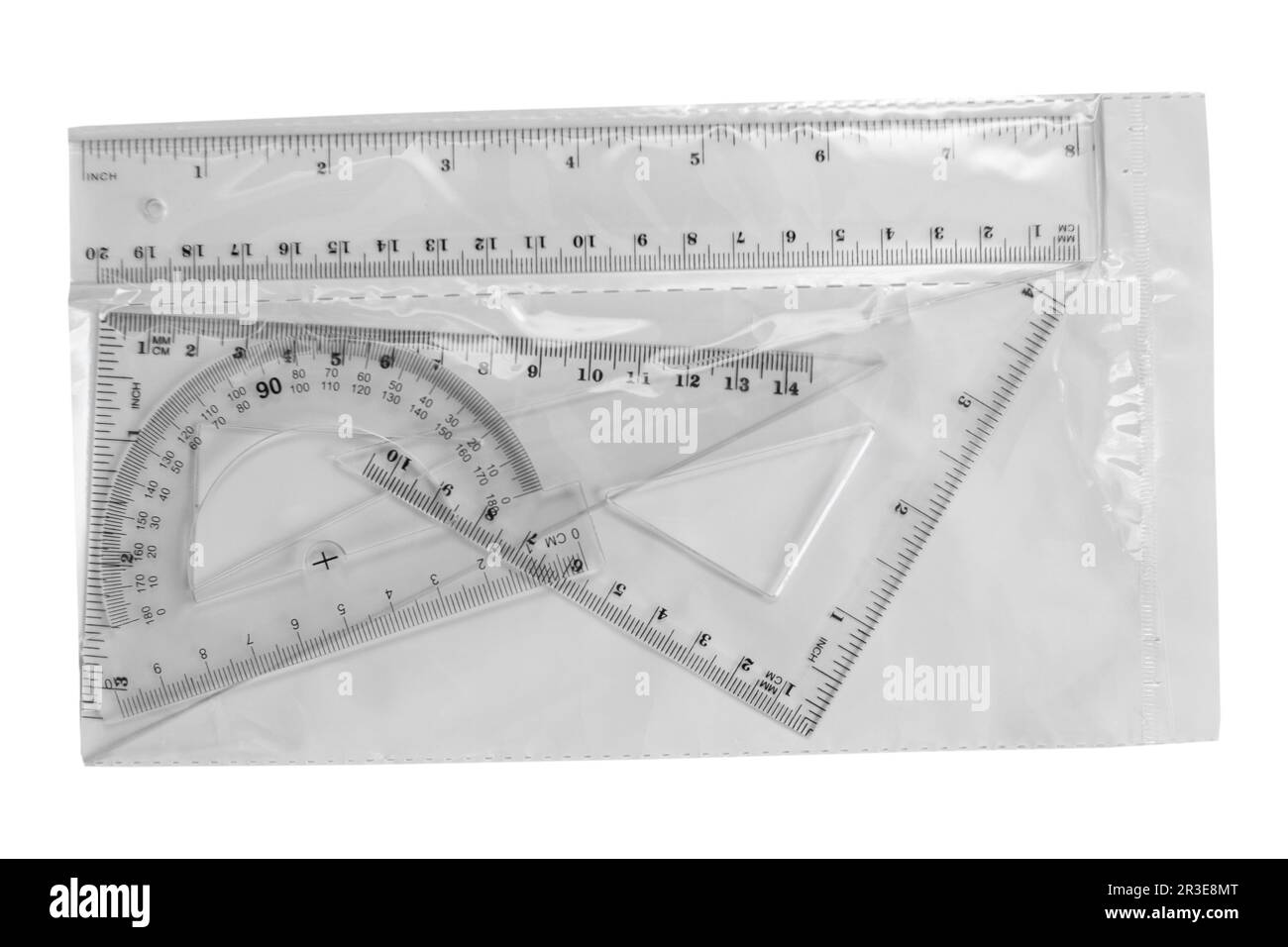 set of packaging Plastic ruler, protractor, triangle, isolated on white ...