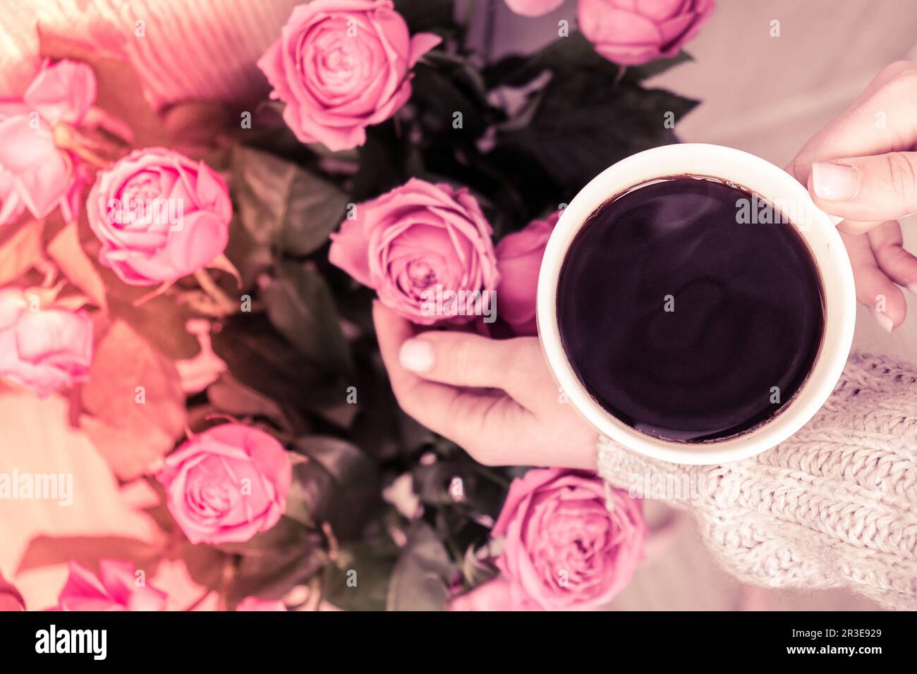 Cup of coffee and pink roses. Holiday concept, bouquet of roses for a ...