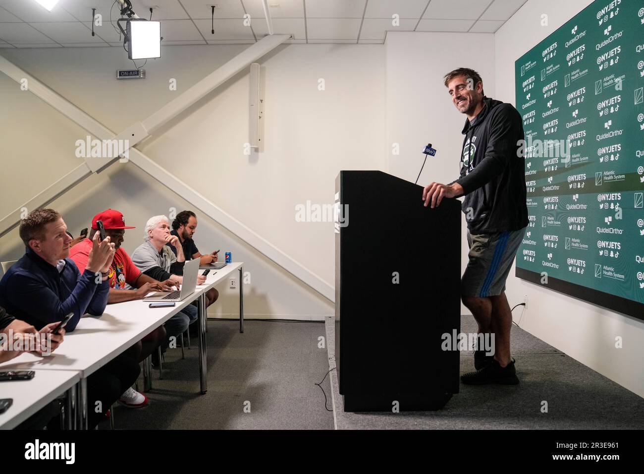 New York Jets quarterback Aaron Rodgers speaks to members of the media ...