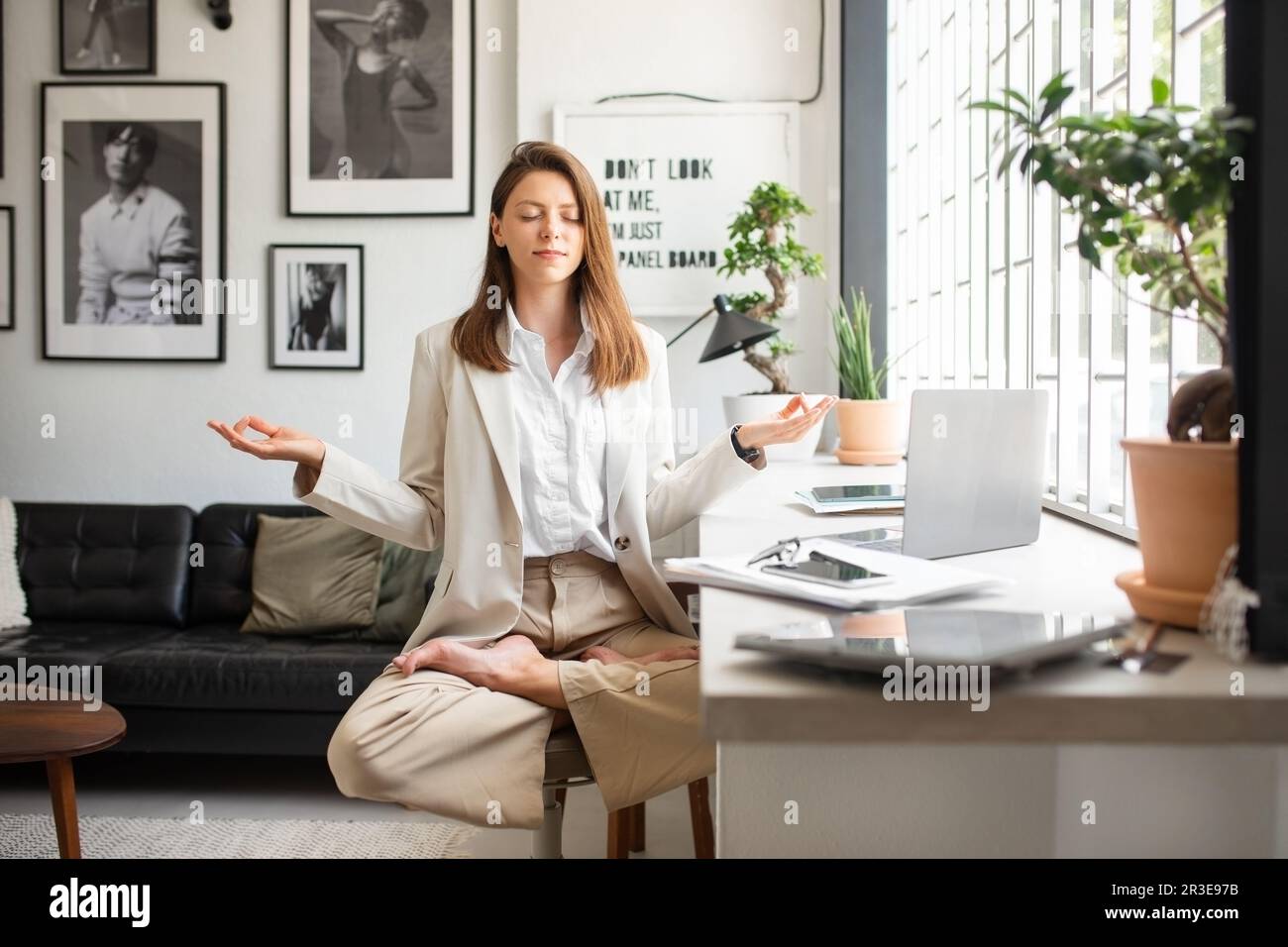 Yoga, mental health and breathing exercise. Young woman office worker ...