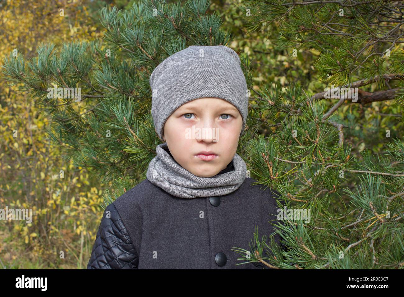 Boy in coat hi-res stock photography and images - Alamy