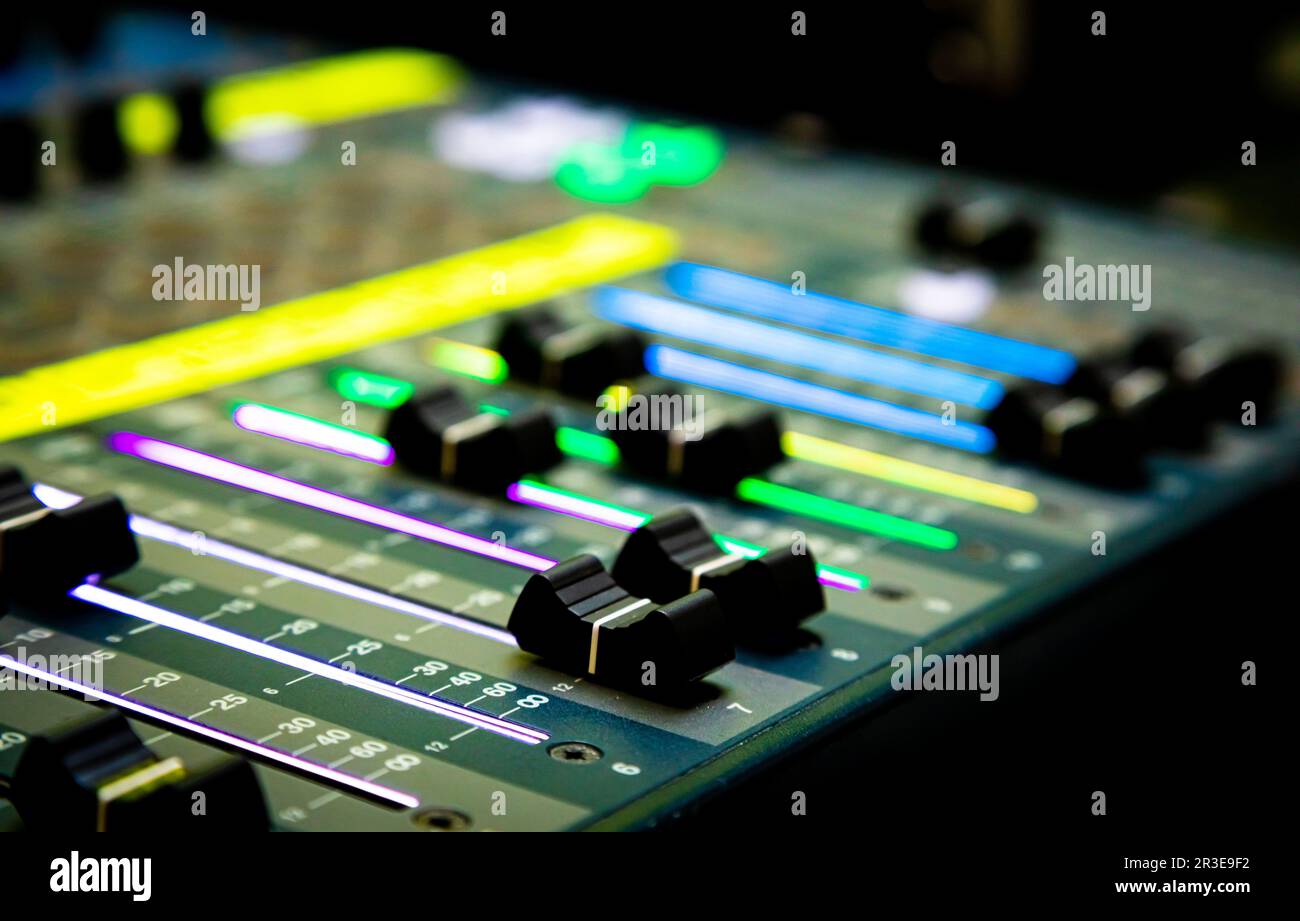 Sliders and buttons on Audio Mixing Desk at live event Stock Photo - Alamy