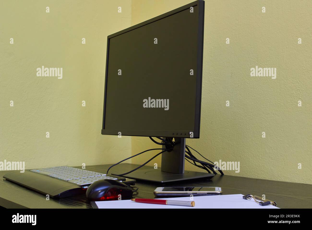 Modern personal computer on desktop in office room,black table with ...