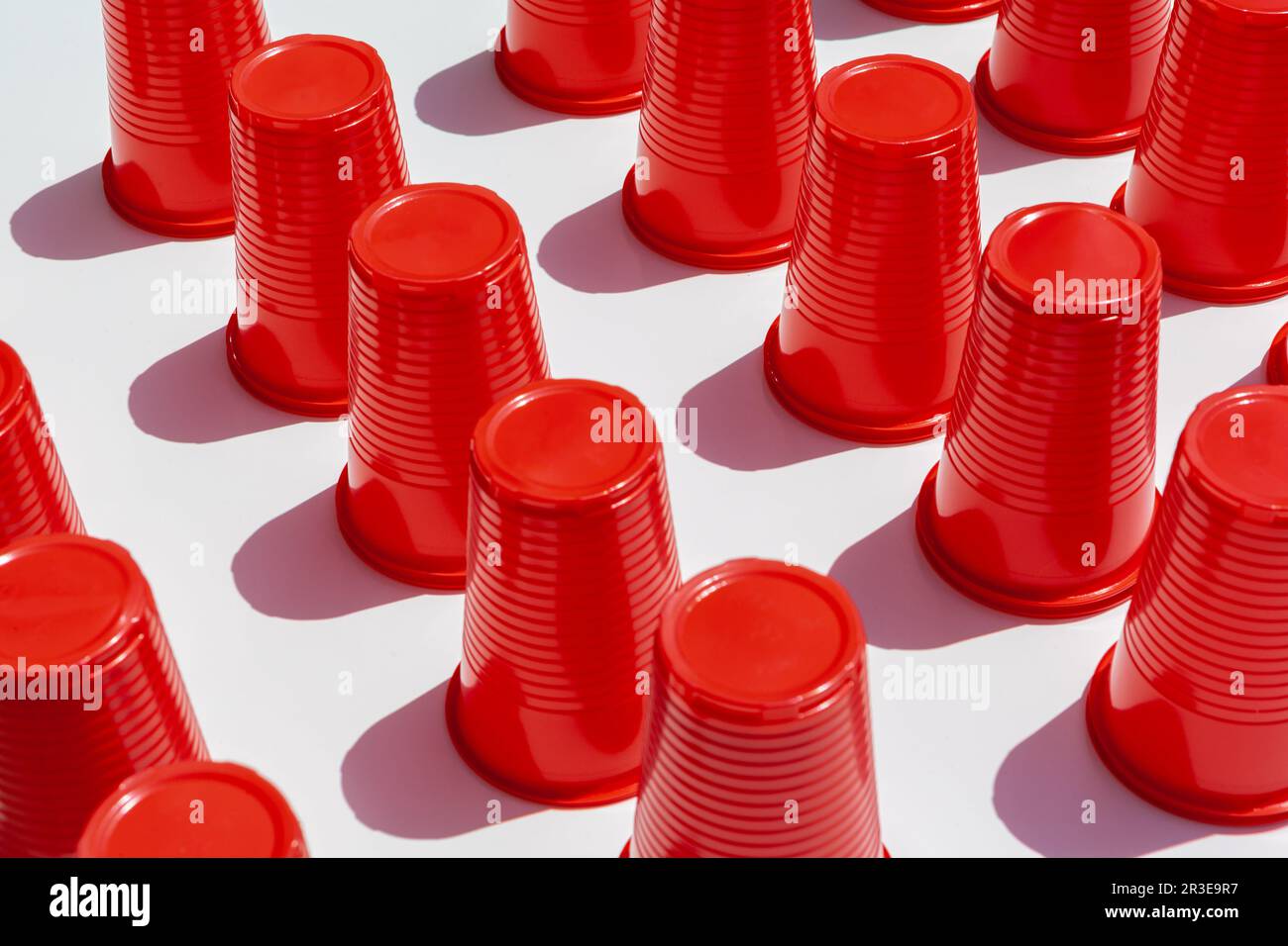 Red Plastic Drinking Cups pattern as a background Stock Photo - Alamy