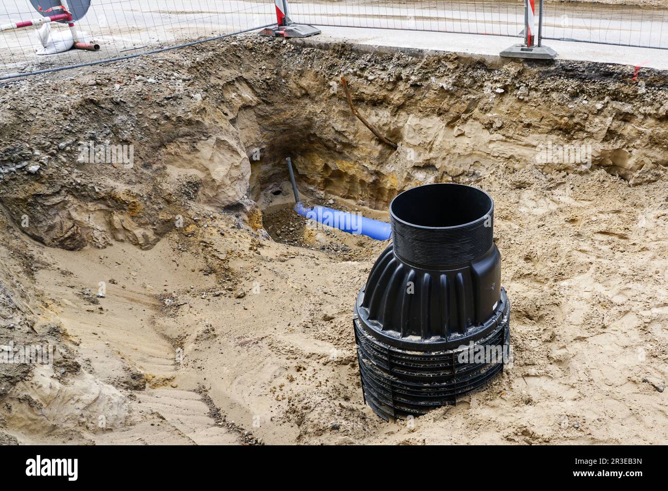 Installed new modern vertical black plastic sewage well during ...