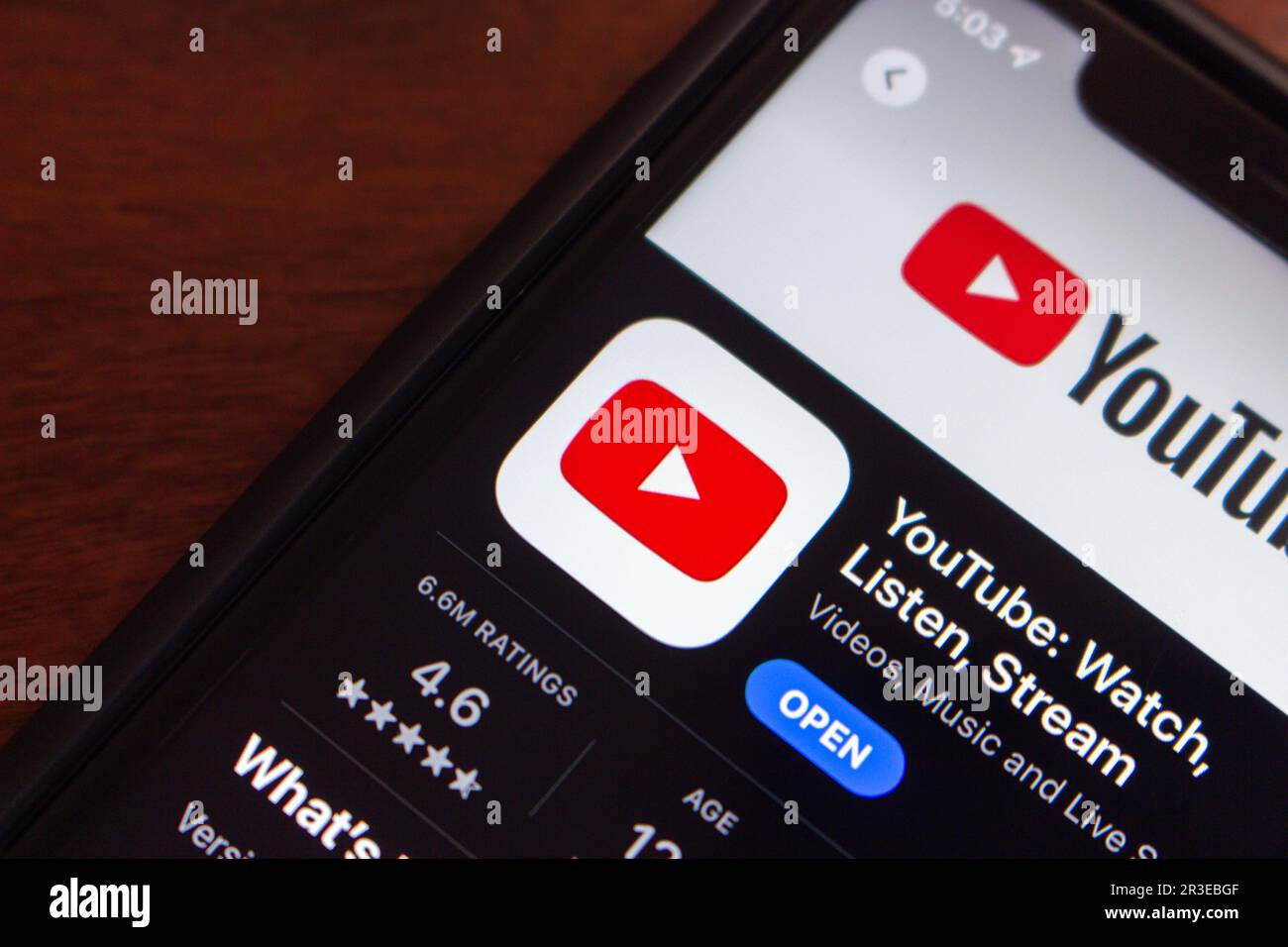 YouTube app icon seen in an App Store on an iPhone screen. YouTube is ...
