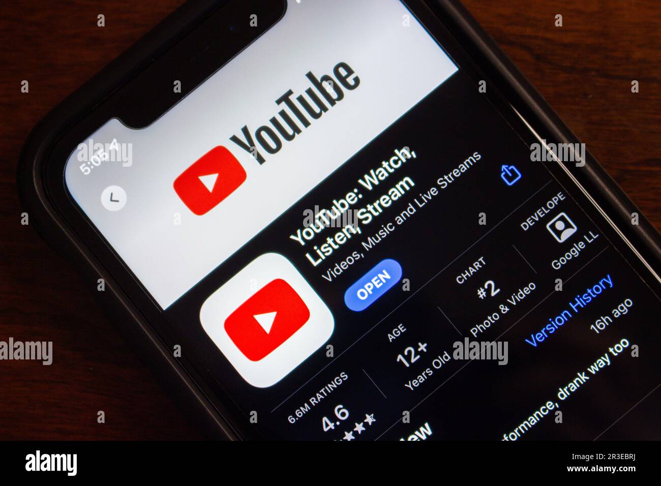 YouTube app icon seen in an App Store on an iPhone screen. YouTube is ...