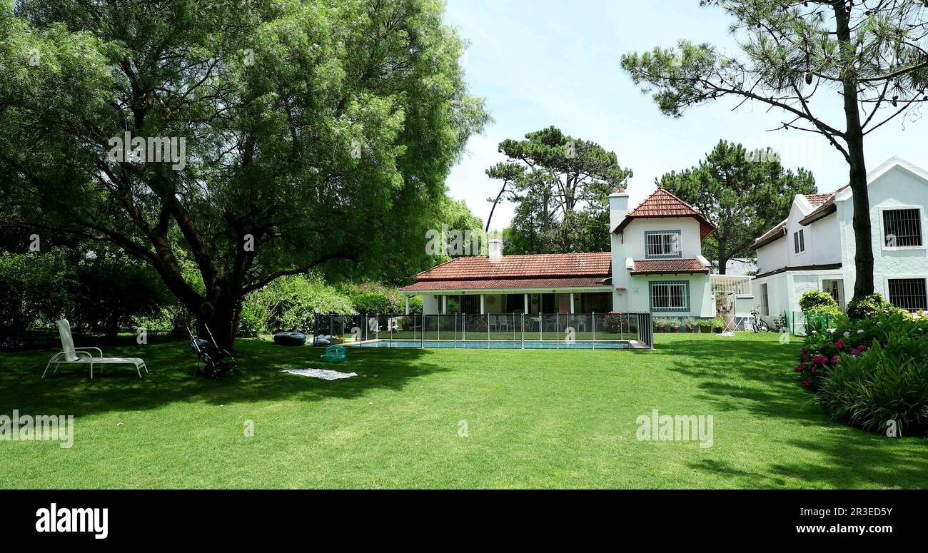 Residential home exterior backyard. Establishing scene of house from ...