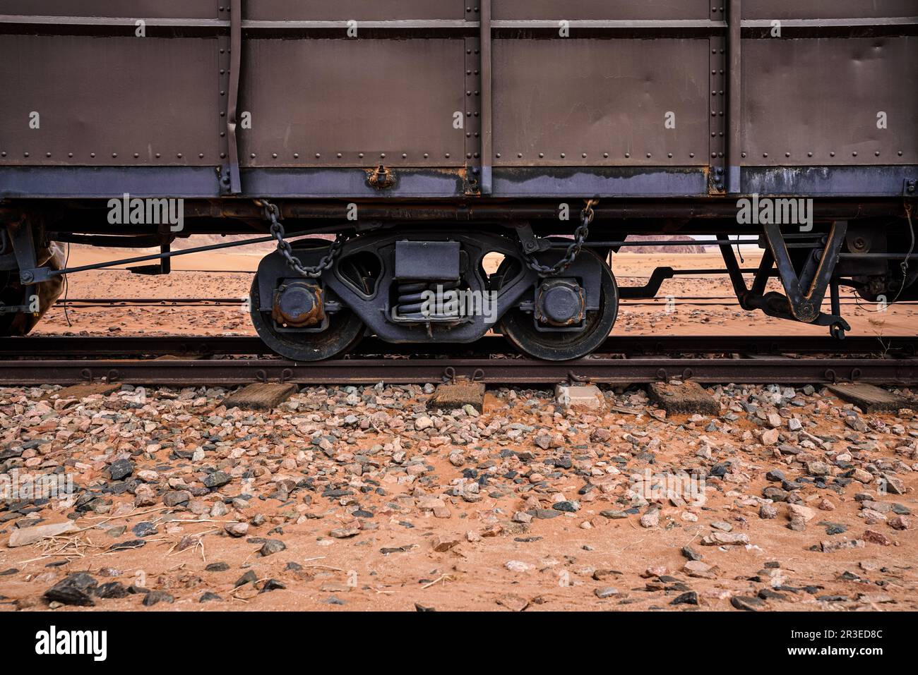 Old cargo train at Wadi Rum desert station, red sand and dust near ...
