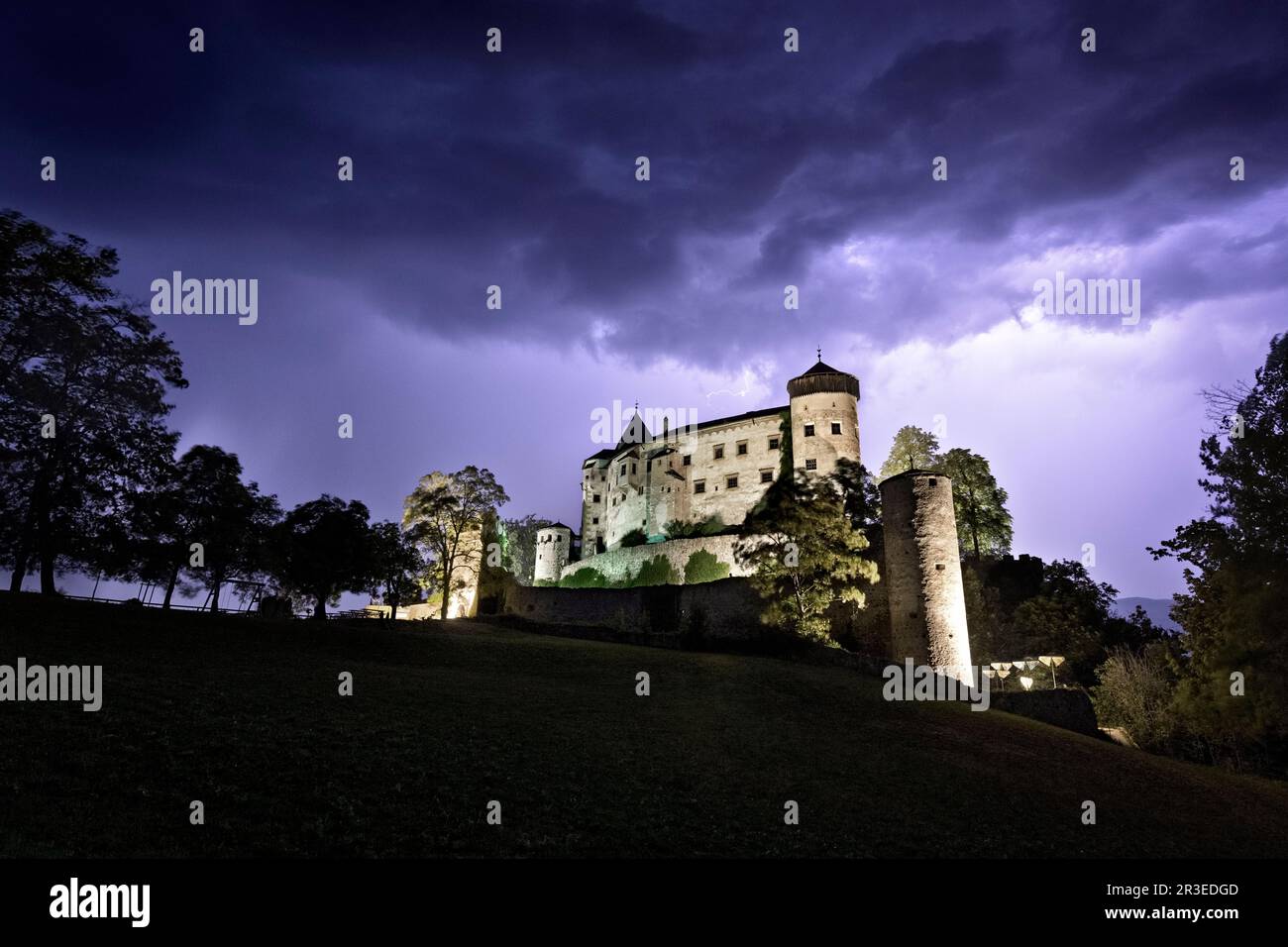 The medieval gothic castle of Presule on a stormy night. Fiè allo ...