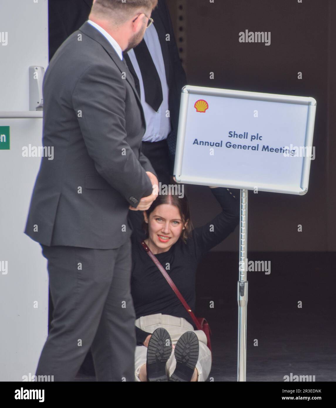 London, UK. 23rd May 2023. A climate activist is removed from Shell's ...