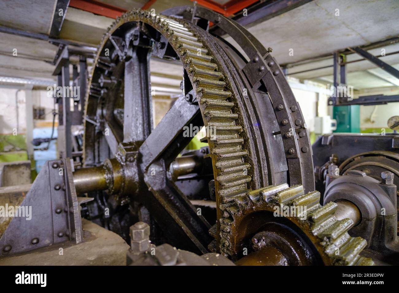 Very large gears. Smeared with oil. Cable car lifting devices Stock ...
