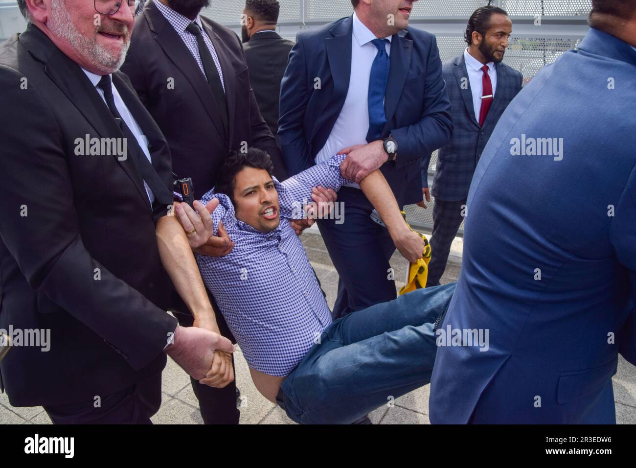 London, UK. 23rd May 2023. A climate activist is removed from Shell's ...