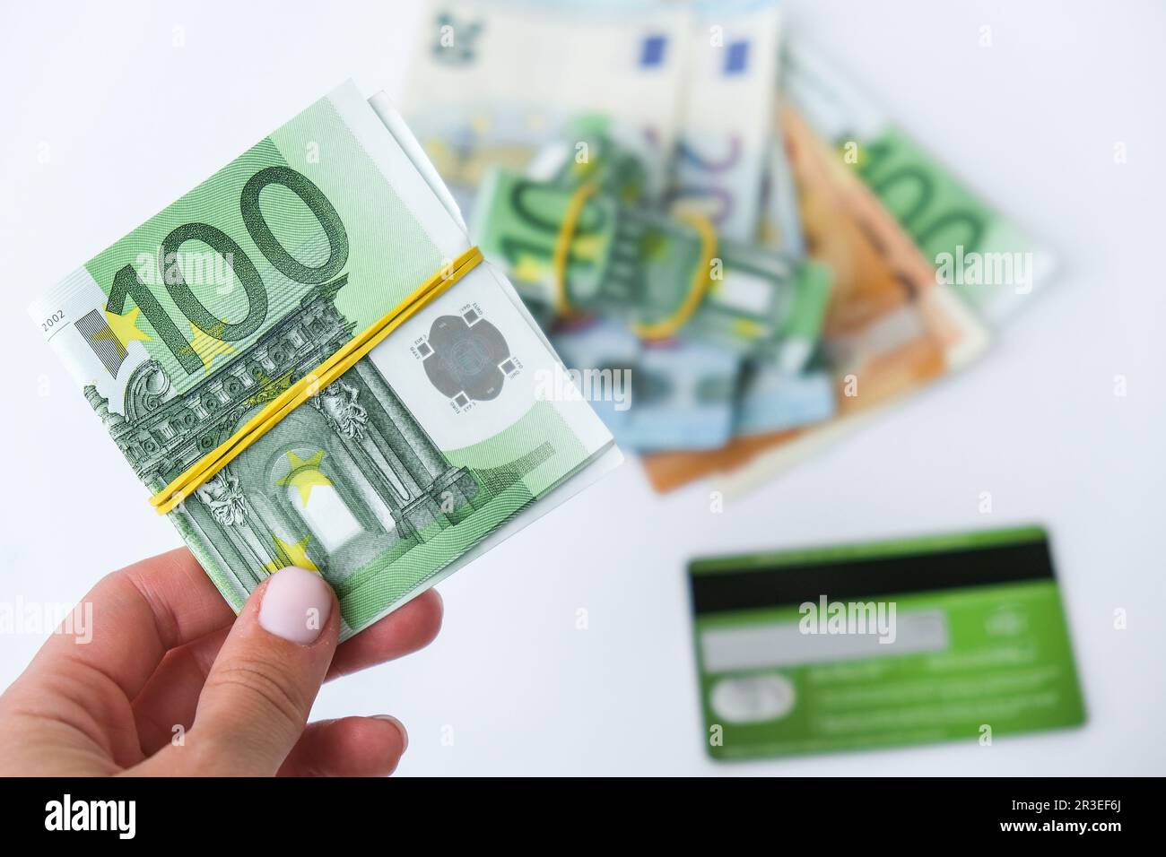 Female hand holding euro close up. Money currency. Credit card debit ...