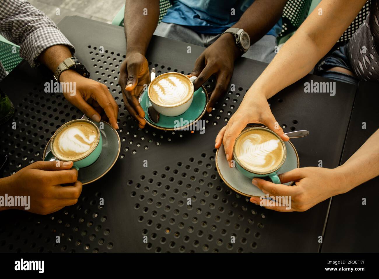 Group of people holding coffee cups, top view Stock Photo - Alamy