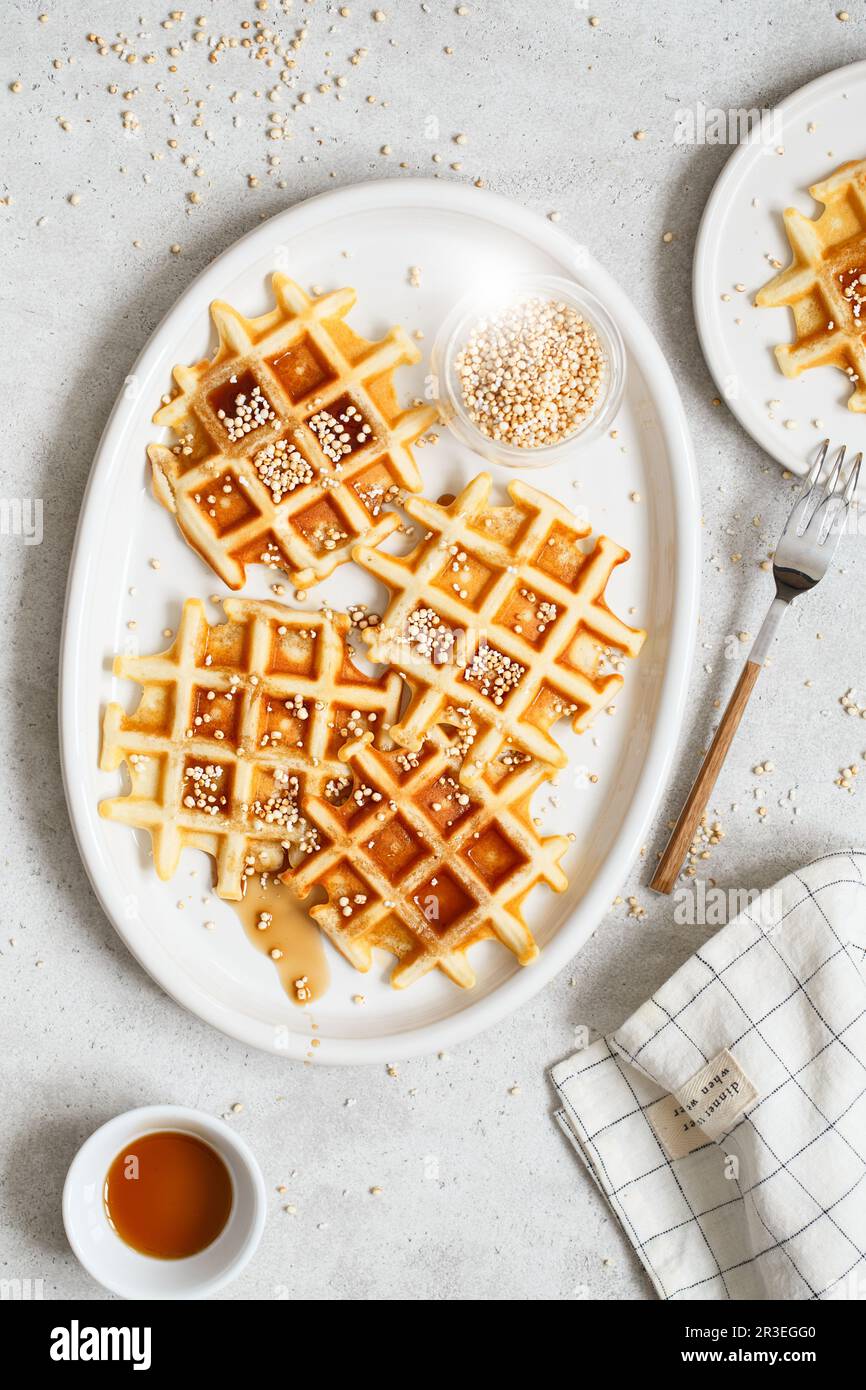 Belgian or Brussels waffles with maple syrup and puffed quinoa pops ...