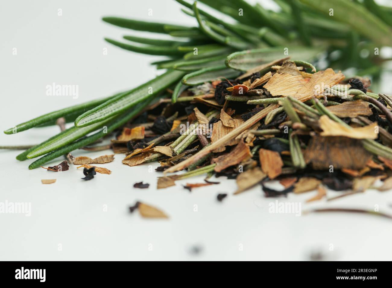 Dried tea leaves close up on white background Stock Photo - Alamy