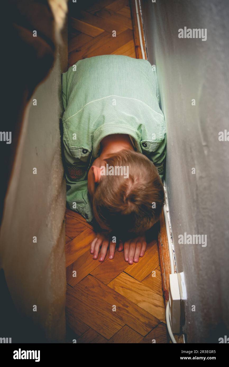 Hide and seek game in home Stock Photo - Alamy