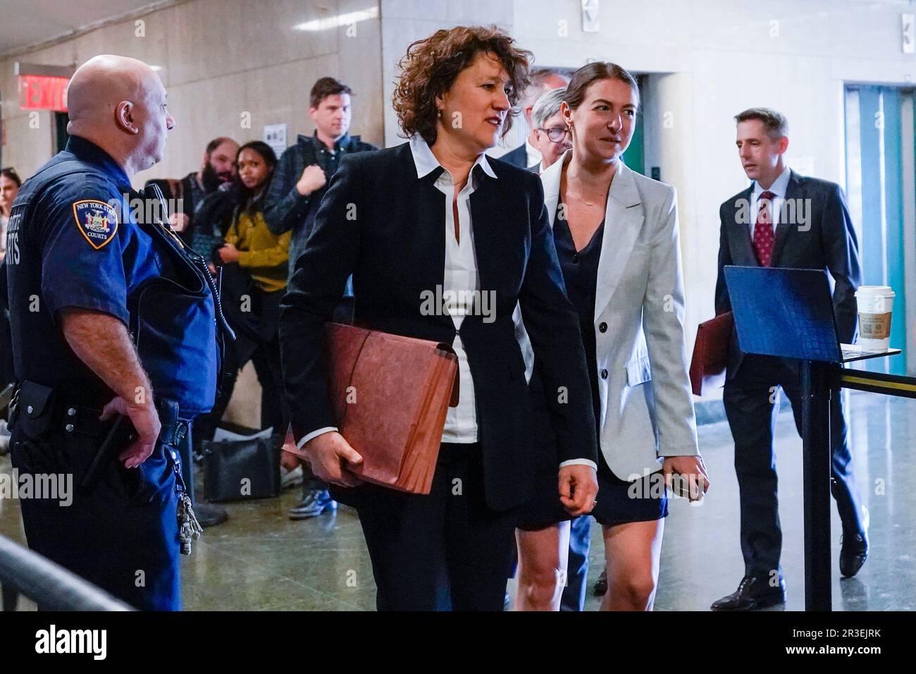 Prosecutor Susan Hoffinger, center, arrives at Manhattan Supreme Court ...