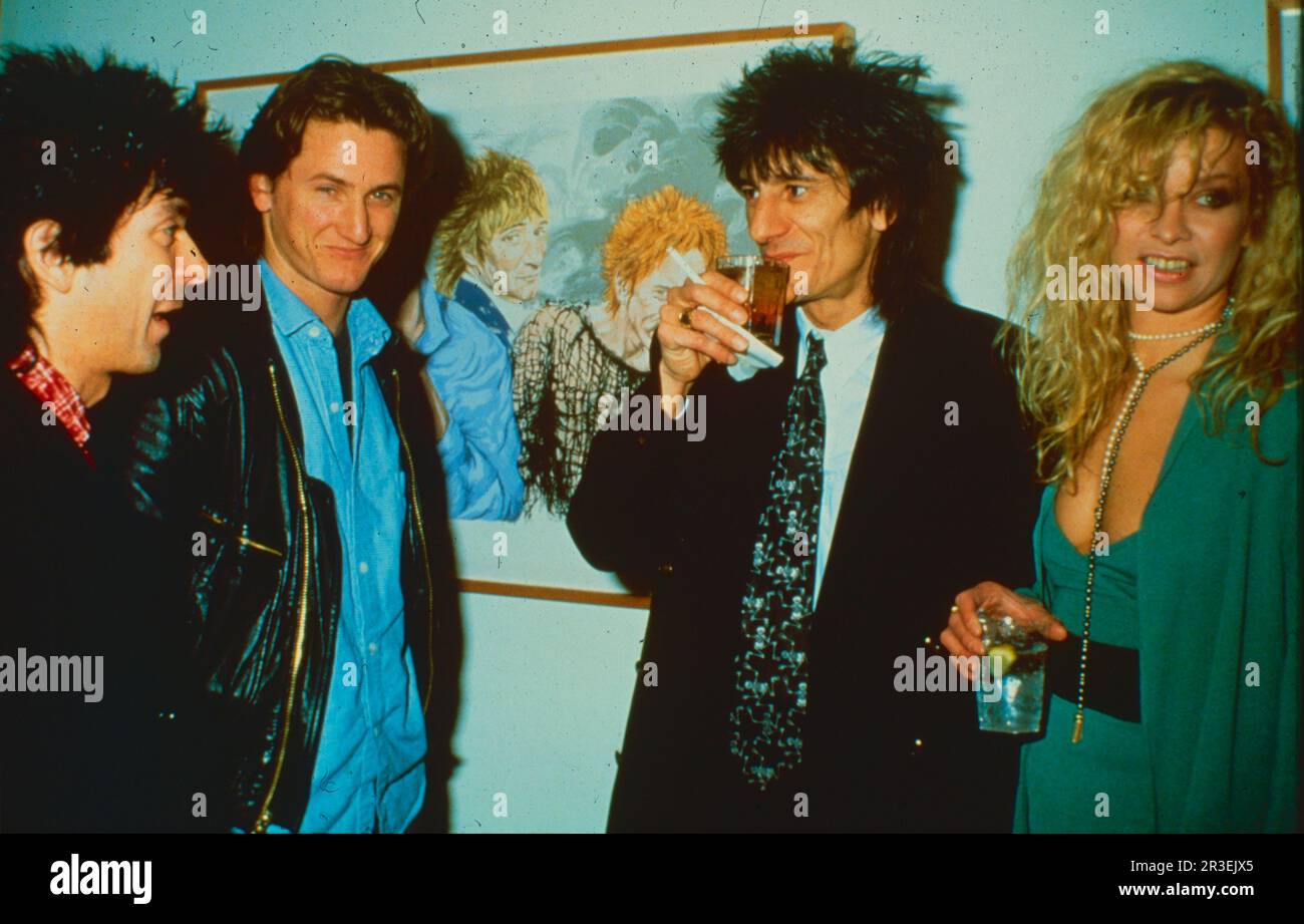 London. UK. LIBRARY. Ronnie Wood and wife Jo Wood with Sean Penn and ...