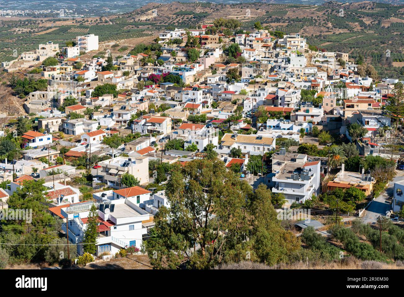 The village of Kamilari, situated on a hill in the south of Crete Stock ...
