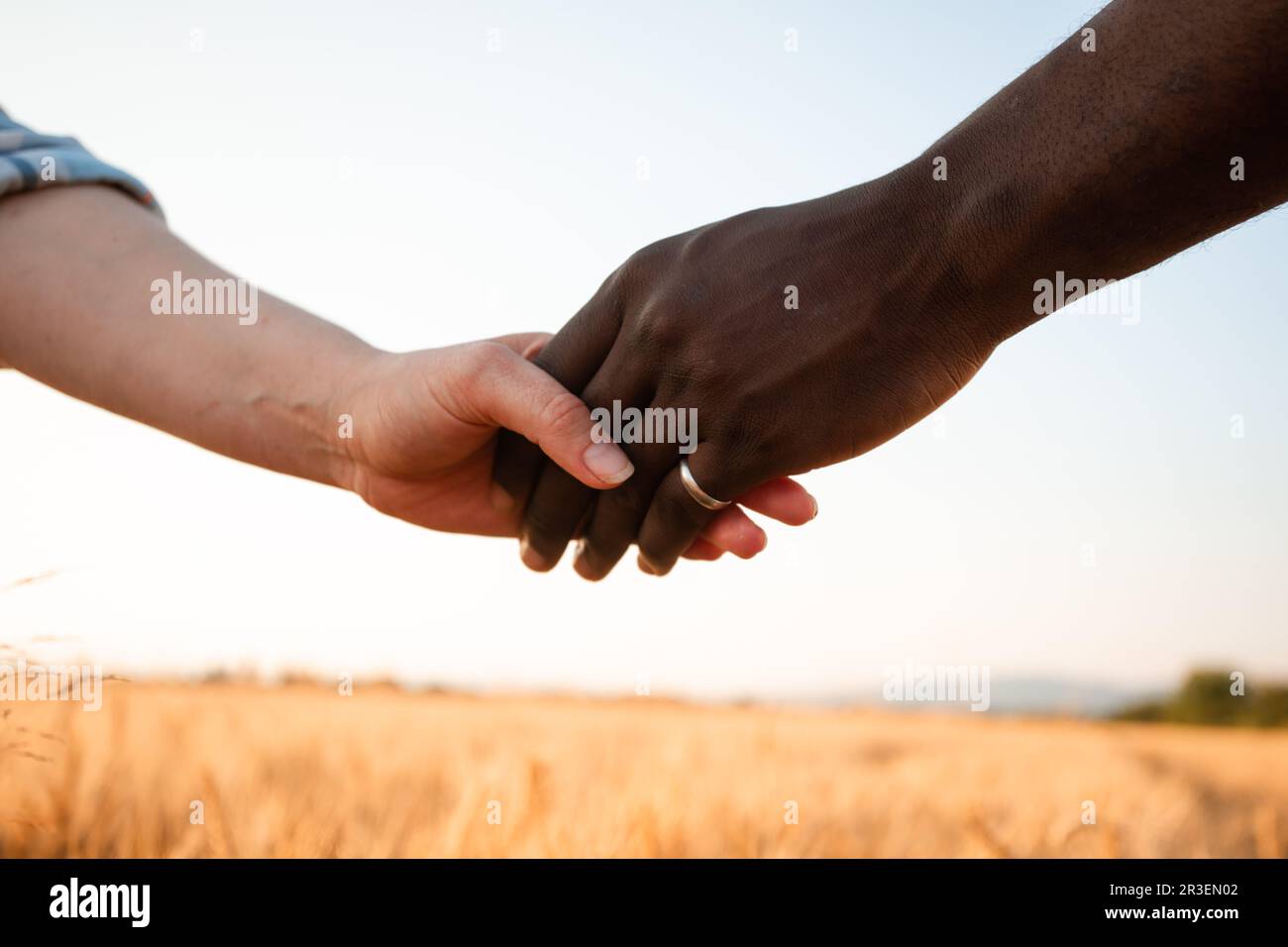 Two hands touching black and white hi-res stock photography and images ...