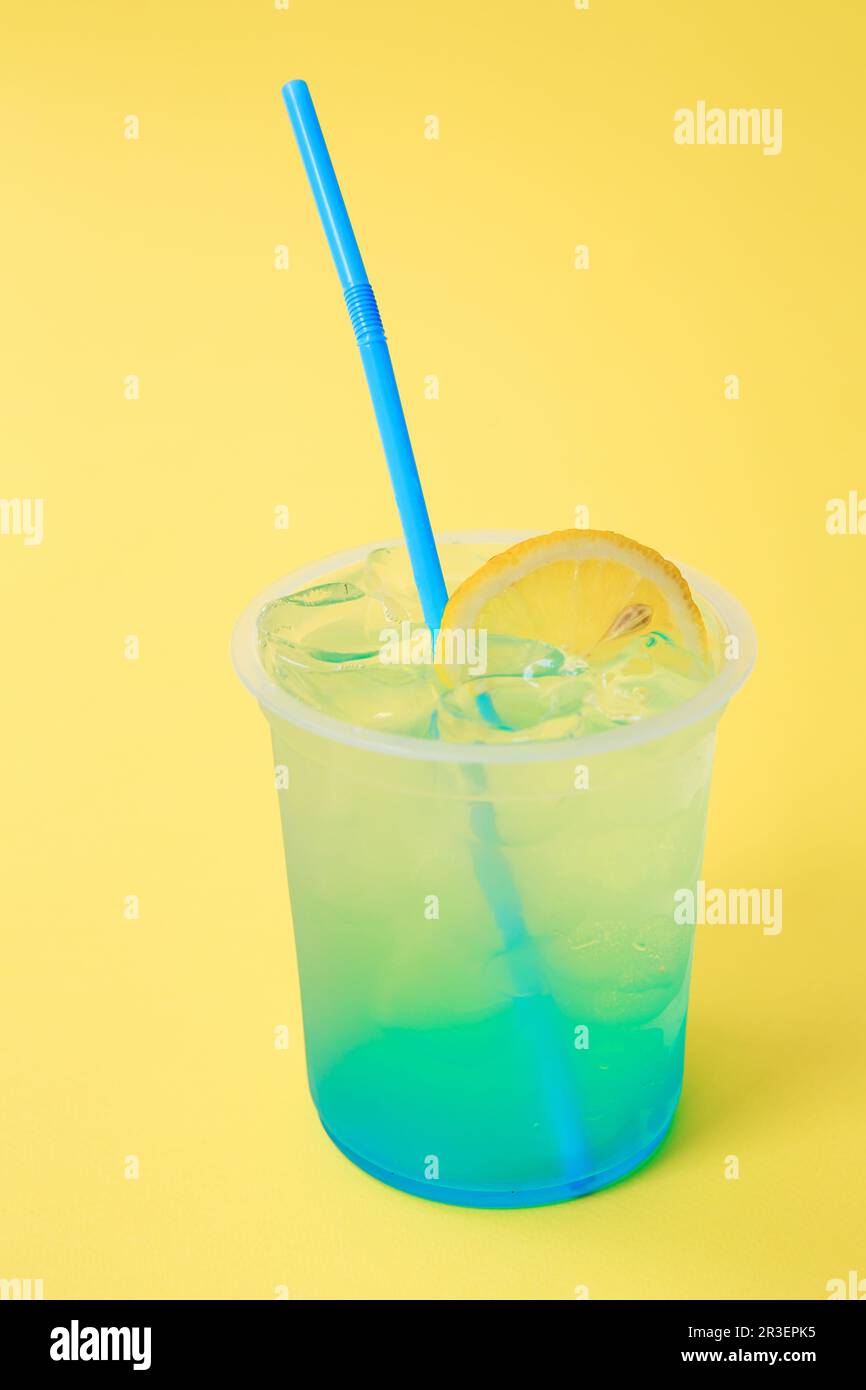 A glass with lemonade blue Lagoon with lemon, cold refreshing drink or ...