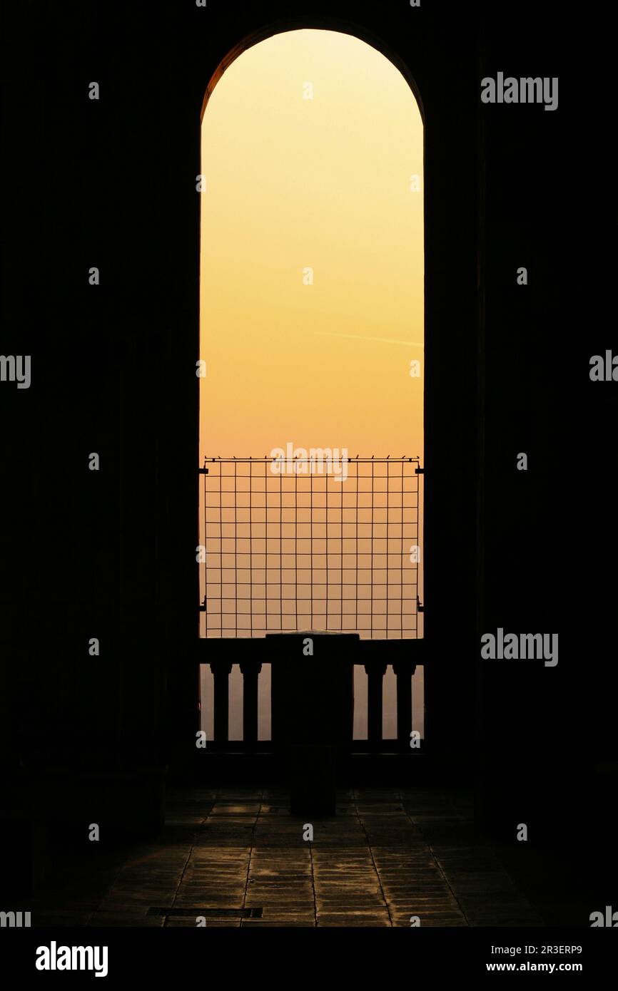 Silhouette of arcade window at sunset Stock Photo - Alamy