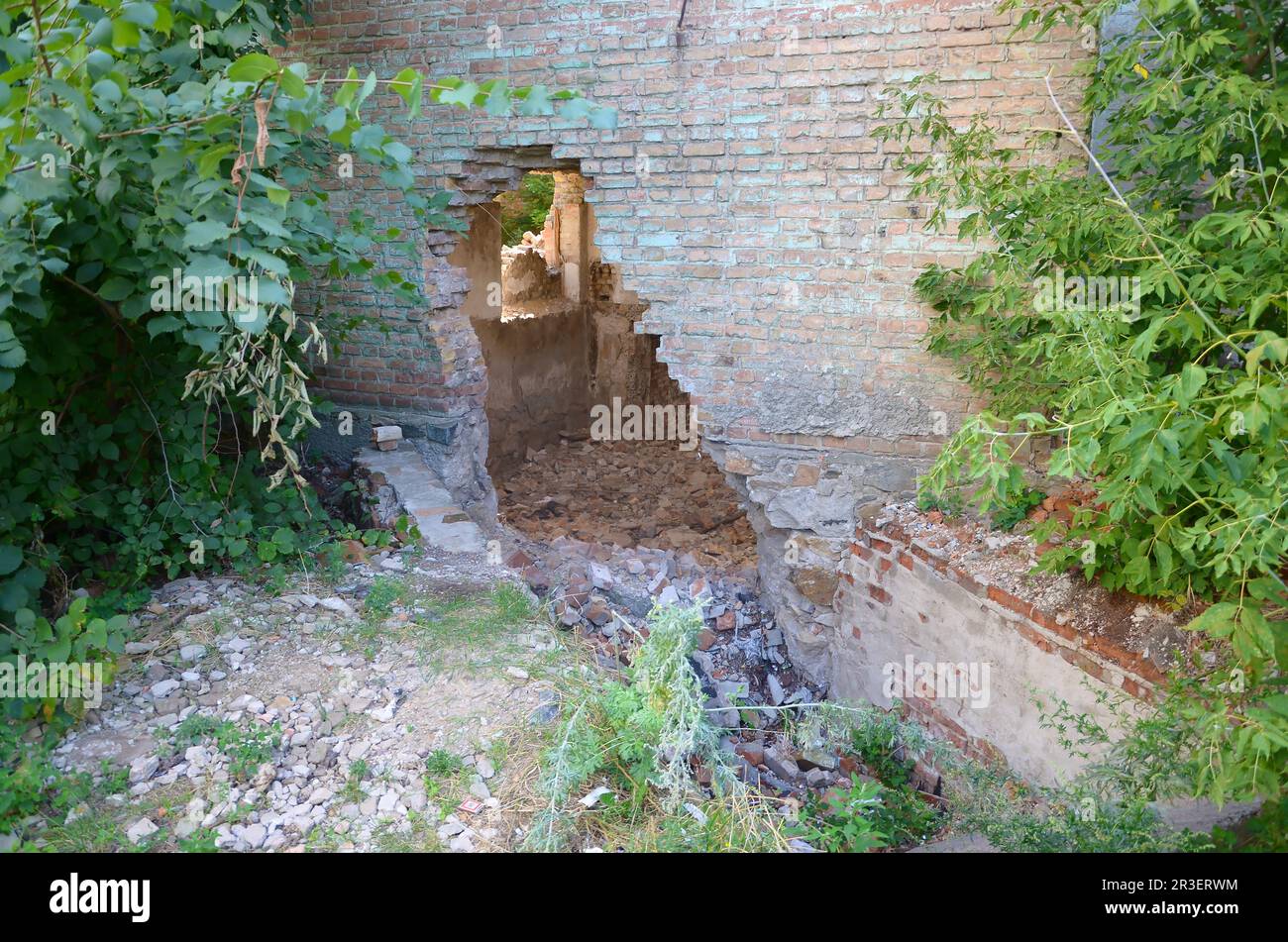 Collapsed industrial multistorey building in daytime. Disaster scene ...