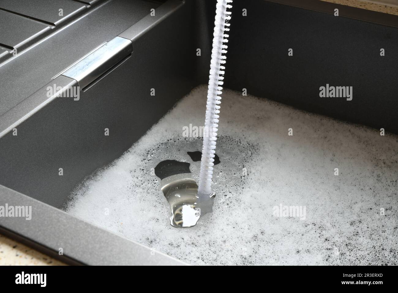 Overflowing kitchen sink, clogged drain, plumbing problems, trying to ... Overflowing kitchen sink, clogged drain, plumbing problems, trying to ...