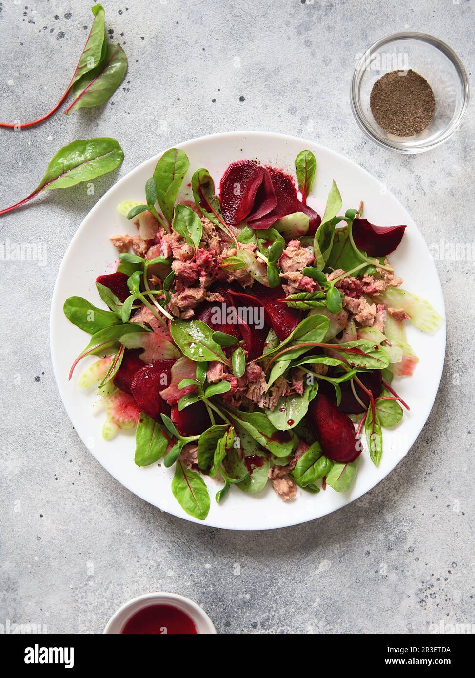 Healthy fresh salad. Beetroot, red chard and canned tuna salad. Healthy ...