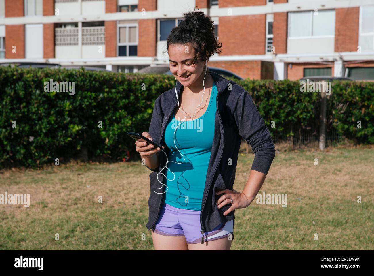 happy girl using her mobile Stock Photo - Alamy