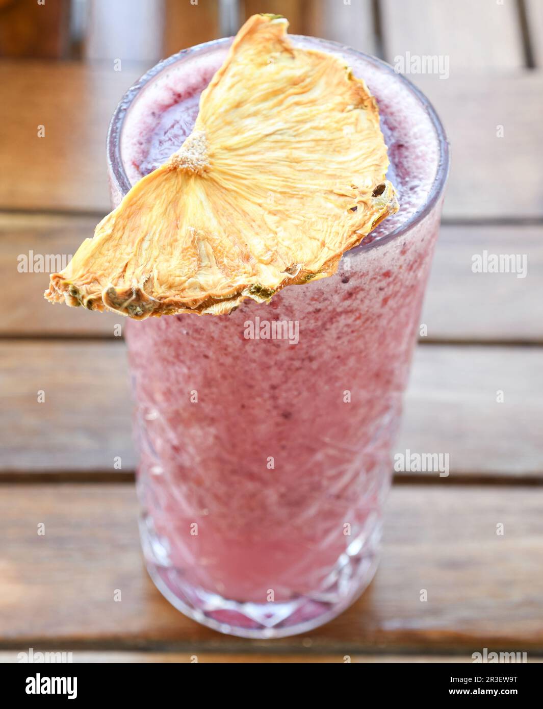 close-up shot from above of a strawberry smoothie garnished with a ...