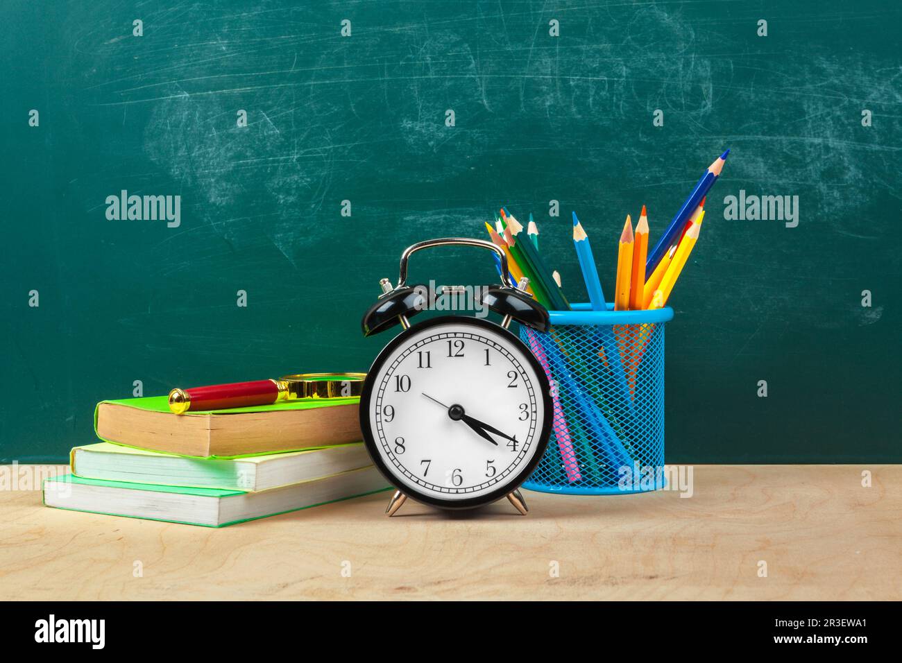 School supplies. Writing utensils and alarm clock. Time to study ...