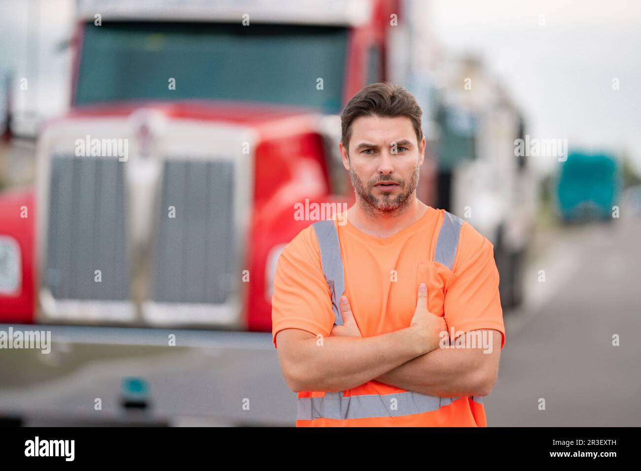 Men driver near lorry truck. Man owner truck driver in safety vest near ...