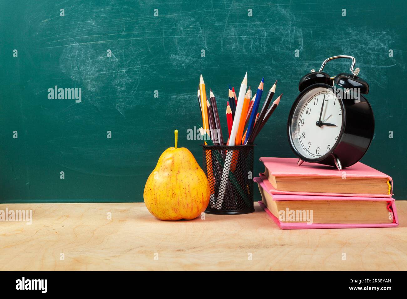 School supplies. Writing utensils and alarm clock. Time to study ...