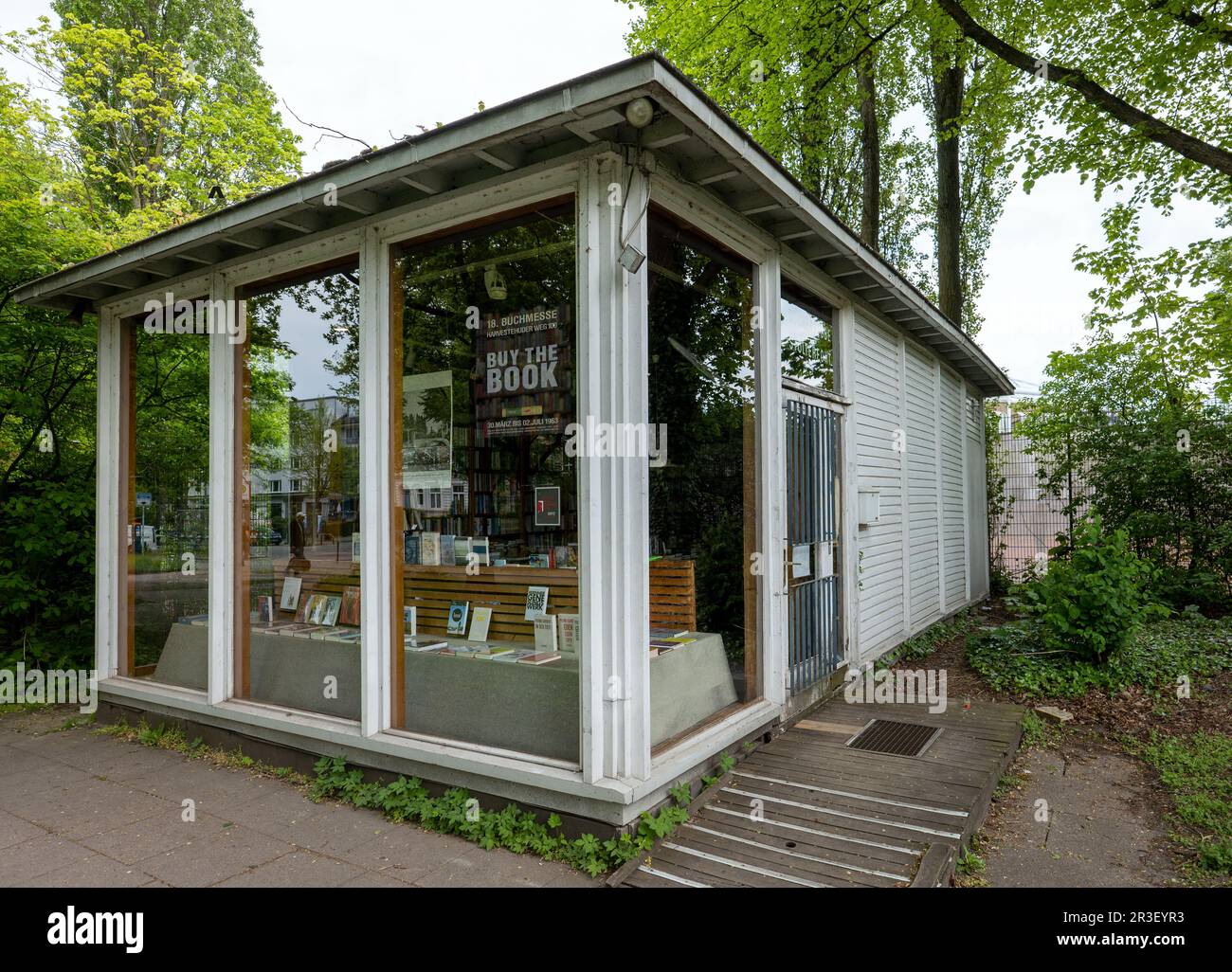 Old, small bookstore in the city. (Poster in window [royalty free] for ...